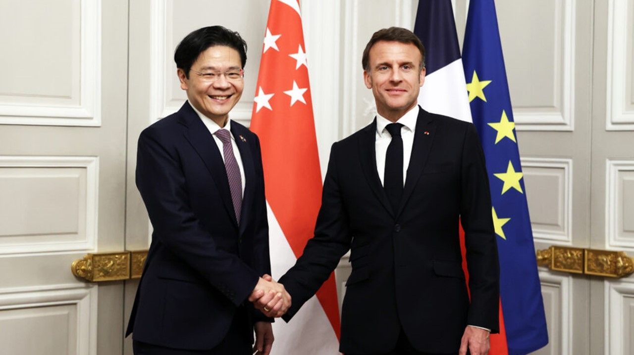 Deputy Prime Minister Lawrence Wong and French President Emmanuel ...
